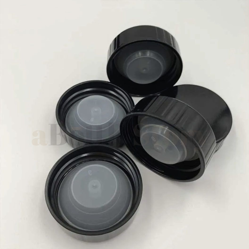 Black Phenolic Cap With Poly Cone Insert Polyseal - A Bottle Story